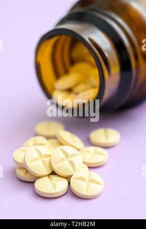 Glass containers and tablets, Germany Stock Photo - Alamy