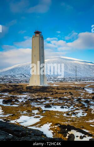 Lighthouse of Malarrif, peninsula Snaefellsnes, in the background the ...