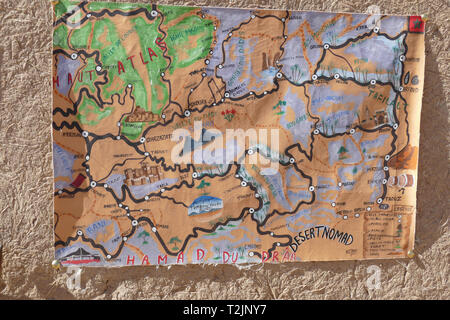 RISSANI, MOROCCO - FEB 15, 2019 - Painted map of the Moroccan Sahara ...