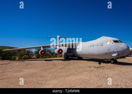 A US Air Force C-141B Starlifter aircraft approaches the runway at ...
