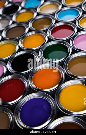 Collection of colored paints cans, Brush, red background Stock Photo ...