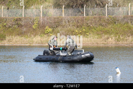 Royal Navy personel demonstrating their underwater Remus drone during a ...