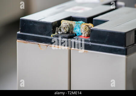 Old battery corrosion, seal lead acid battery damage Stock Photo - Alamy