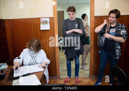 Army conscripts undergo medical examination in a regional assembly ...