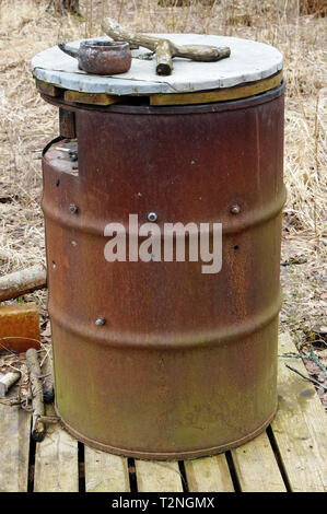 Closeup of cigarette in public ashtray. Extreme closeup, selective ...