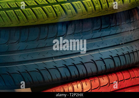 many colors car tires detail Stock Photo - Alamy