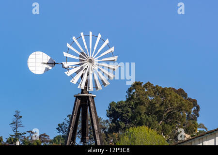 Old water pumping windmill, California Stock Photo - Alamy