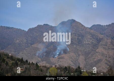 A mountain is seen engulfed in fire at Bubjen in the mountains of ...