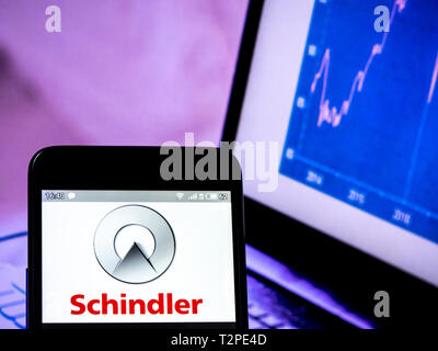 In this photo illustration a Schindler Group (Schindler Holding Ltd ...
