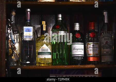 Alcoholic drinks displayed in a pub or bar Stock Photo - Alamy