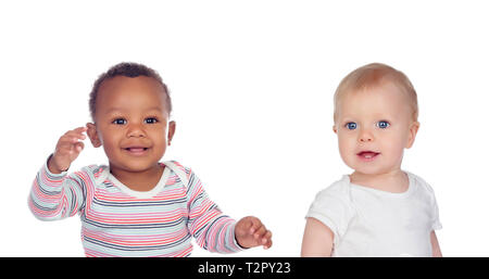 Two happy babies of different races isolated on a white background ...
