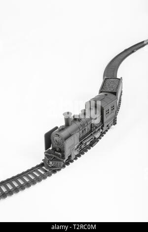 Black painted toy steam engine model. For off track, financial crash ...
