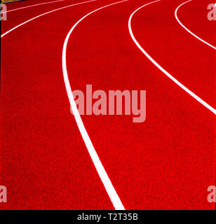 Red racing track with white line rubber texture in stadium texture ...