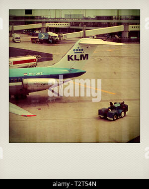 Polaroid effect. SAS aircraft being serviced at Schiphol Airport in ...