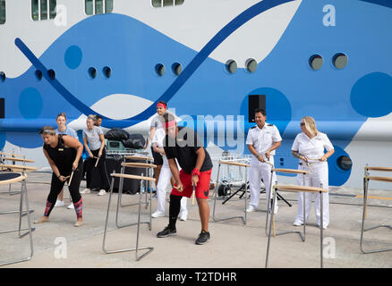 Crew of Aida Perla making music in Antigua alongside the ship Stock ...