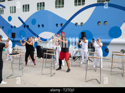 Crew of Aida Perla making music in Antigua alongside the ship Stock ...