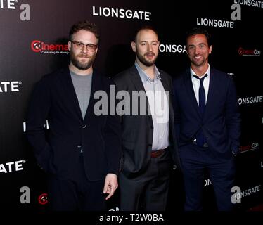 Evan Goldberg, Seth Rogan and James Weaver, from left, arrive for the ...