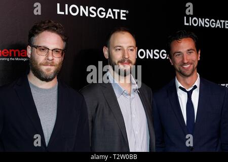 Evan Goldberg, Seth Rogan and James Weaver, from left, arrive for the ...