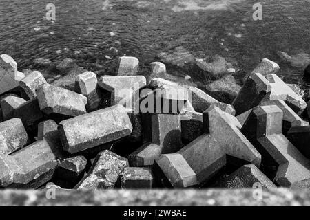 Concrete sea defence blocks at Brighton Marina UK Stock Photo - Alamy