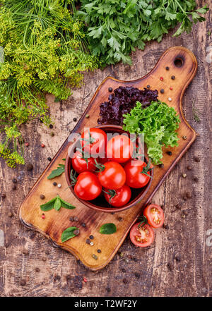 Bunch of fragrant tomato on white background. Top view. Isolated ...