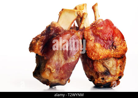 Roasted pork knuckle. Ham and bacon are popular foods in the west ...