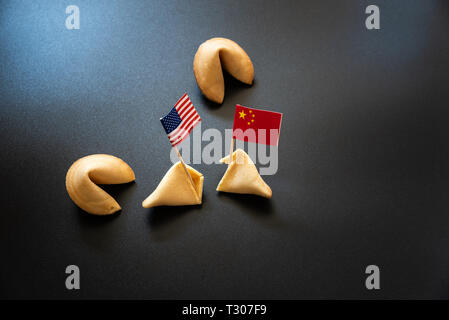Chinese fortune cookies next to American flag, concept of international ...