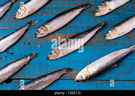 Rustic style. Fish pattern. Herring fish on an old blue wooden ...