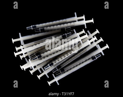 Tuberculin Injection syringes on black background Stock Photo - Alamy
