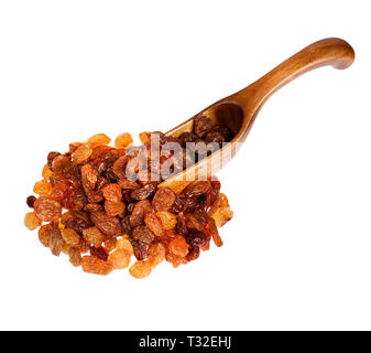 Yellow Raisins in wooden spoon isolated on a white background. Top view ...