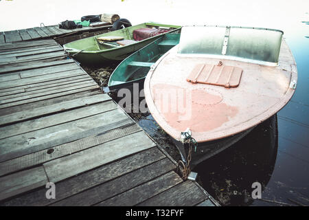 old motor boat at the pier front view Stock Photo - Alamy