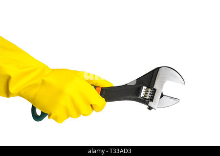 Hand in glove holding Adjustable wrench Stock Photo - Alamy