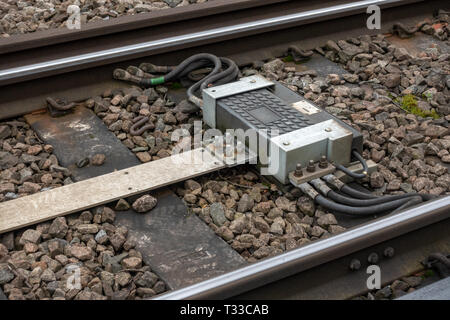 Railway impedance bond and bonding cables Stock Photo - Alamy