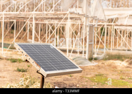 Small size solar cells panels in a garden Stock Photo - Alamy