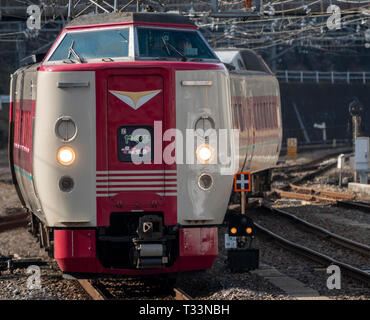 A JR West 381 Series Yakumo express train on the Habuki Line at Bitchu ...