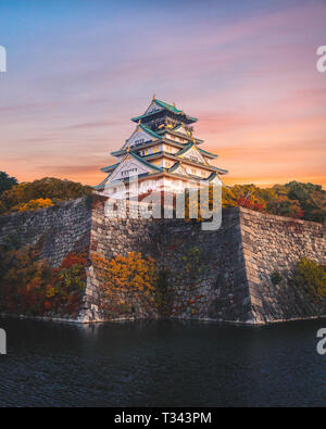 Osaka Castle at sunset Stock Photo - Alamy