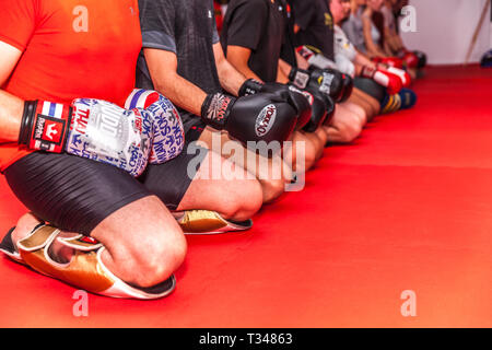 A low blow in a boxing match between two young men Stock Photo ...