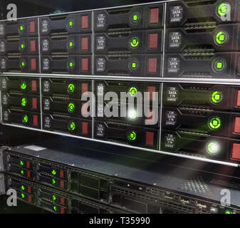 Many powerful servers running in the data center server room. Many ...