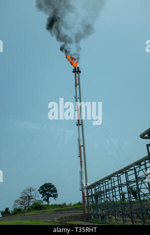 Gas burns and flares from an oil and gas facility in Punta Europa ...