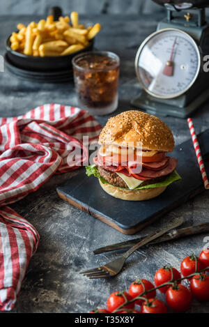 Front view burger fries table Stock Photo - Alamy