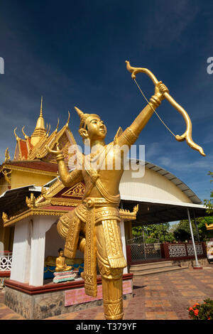 A golden stupa and sculpture at Wat Dey Dos, Kampong Cham, Cambodia ...