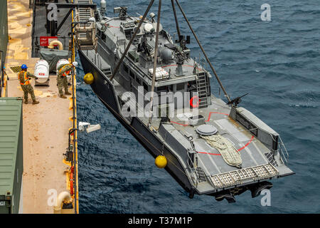 Sailors on board the US Navy's spruance class destroyer USS MOOSBRUGGER ...