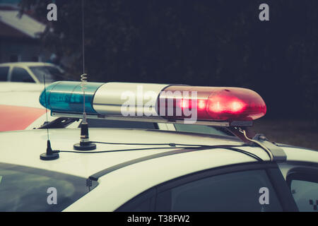 A close up of a swithched rotating beacon of a police car. Cop car ...