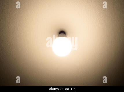 Minimalism light bulb with a blink on pink background. Object and ...