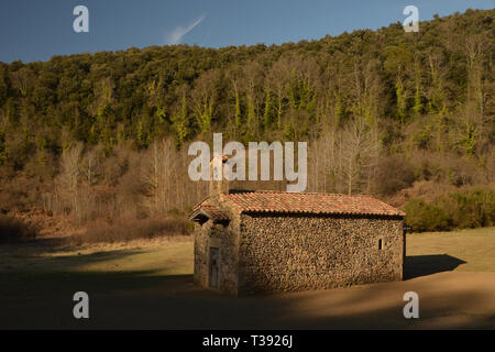 Crater and church building in the Santa Margarida volcano in summer ...