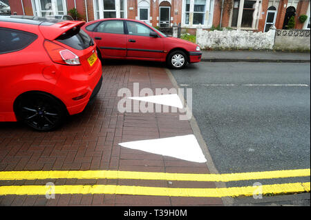 Traffic calming measures to slow down vehicles in a town centre in ...
