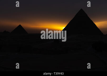 The pyramids in the dark, silhouettes at sunset, Giza, Egypt Stock ...