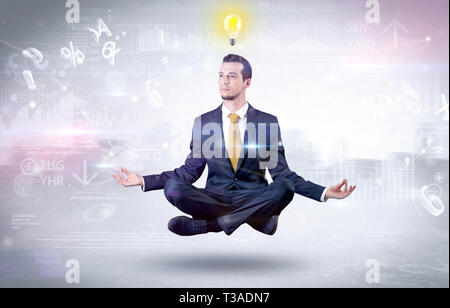 Businessman meditates with enlightenment data reports and financial ...