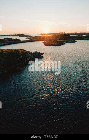 The landscape and coastline around Hoholmen bridge in Nord-Heroy island ...