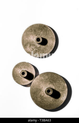 Brass Cogs on White Background Stock Photo - Alamy