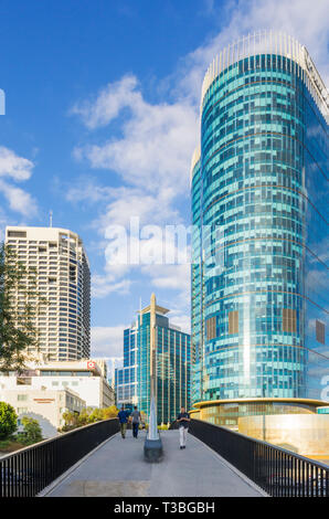 Mount Street pedestrian footbridge and glass facade of the new Woodside ...